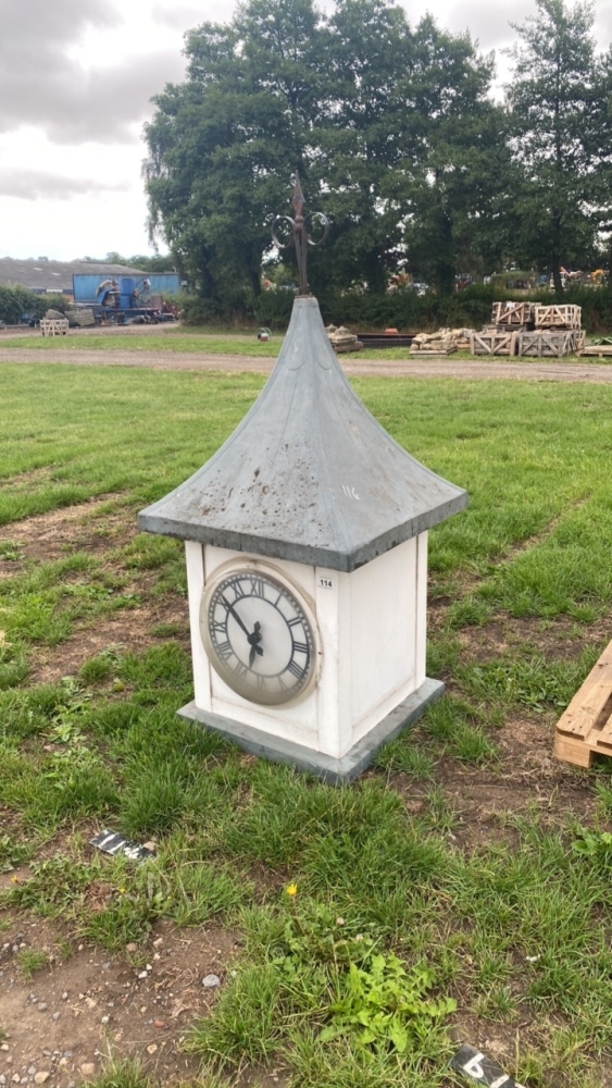 Pavilion clock with faces to 2 sides. Fibreglass construction with mock ...