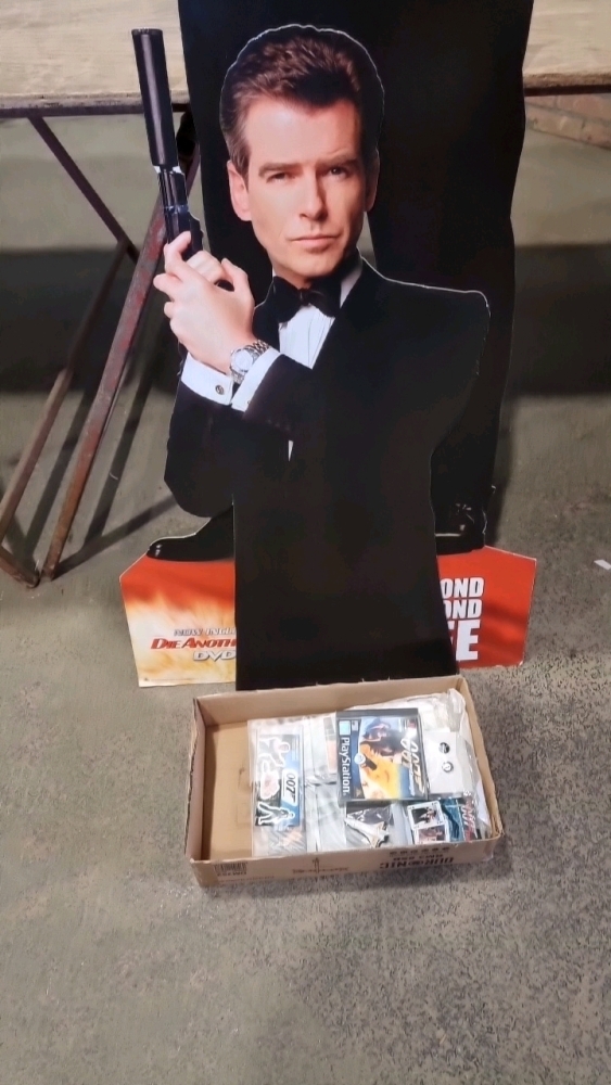 Small collection of James Bond memorabilia including a life size cutout ...