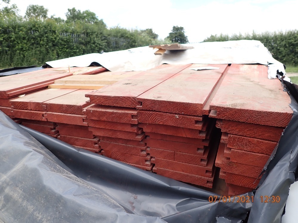 Pack of timber boards, spars, hardwood, joists, kerruing, trailer ...